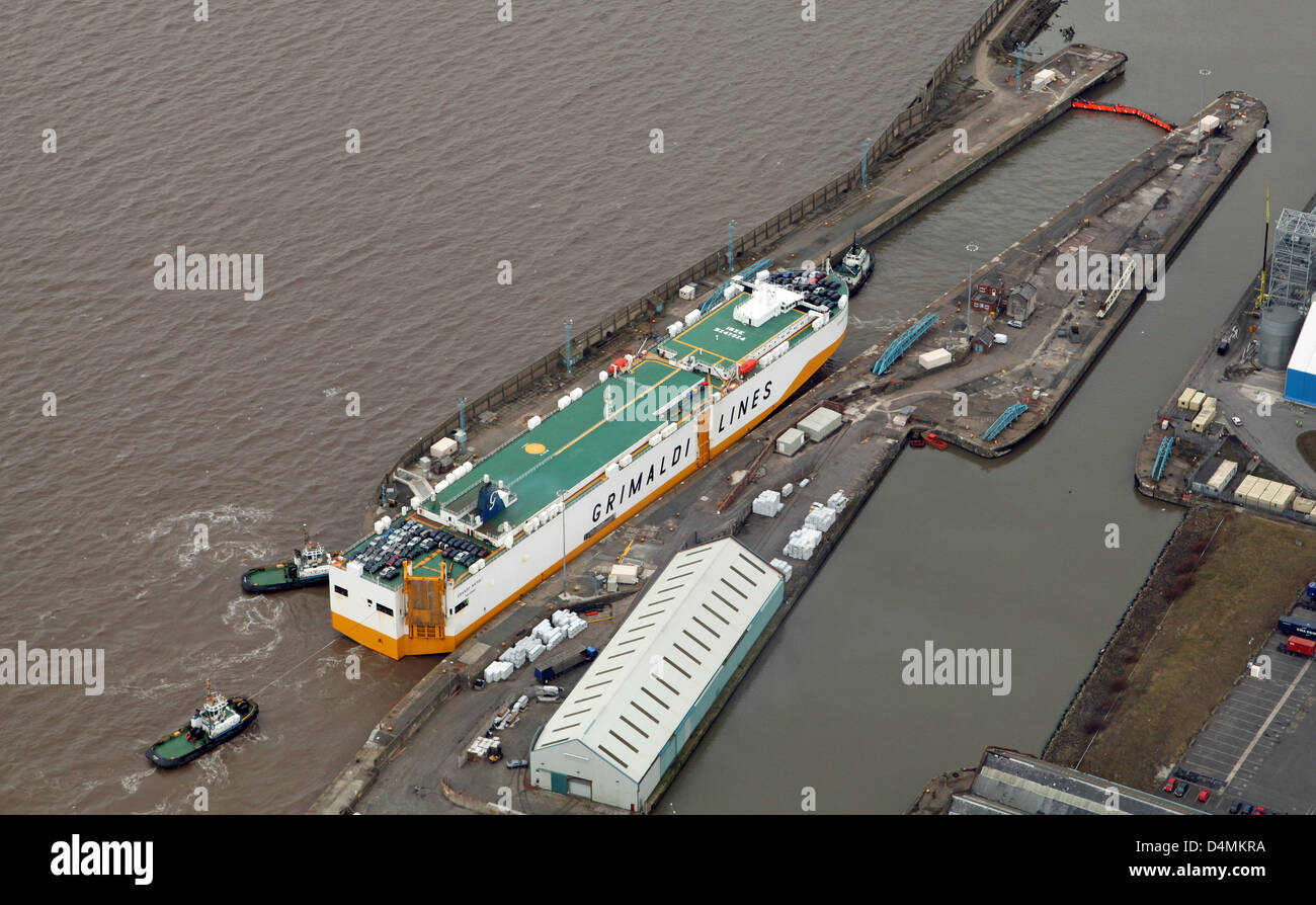 aerial view of a Grimaldi Line ship entering Gladstone Docks via a lock ...