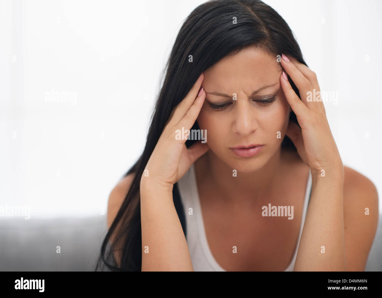 Portrait of stressed young woman Stock Photo - Alamy