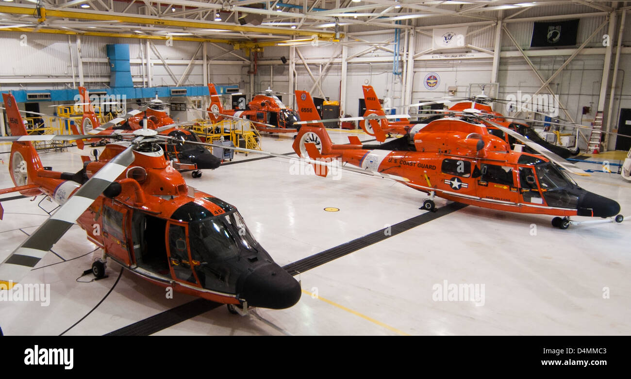 Helos in the hangar Stock Photo - Alamy