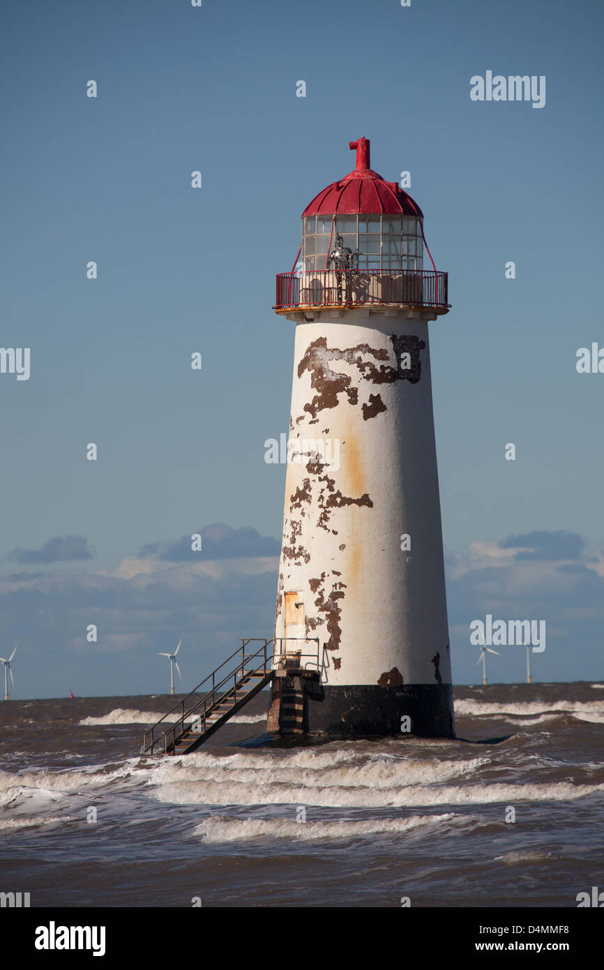 The Wales Coastal Path in North Wales. The Point of Ayr lighthouse on ...