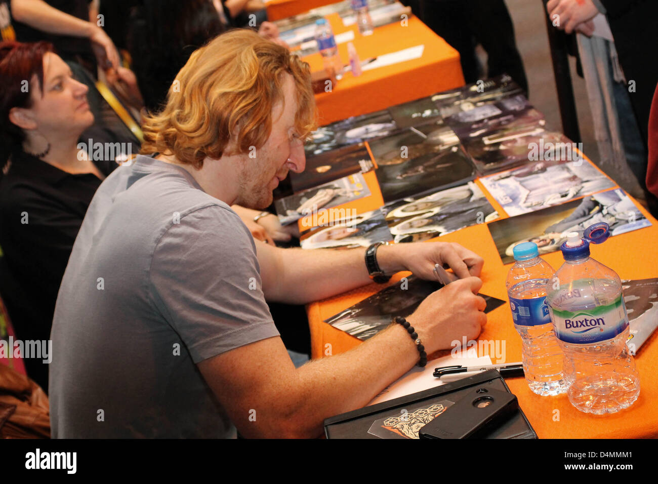 Birmingham, UK. 16th March 2013. Tony Curran, star of Defiance, signs ...