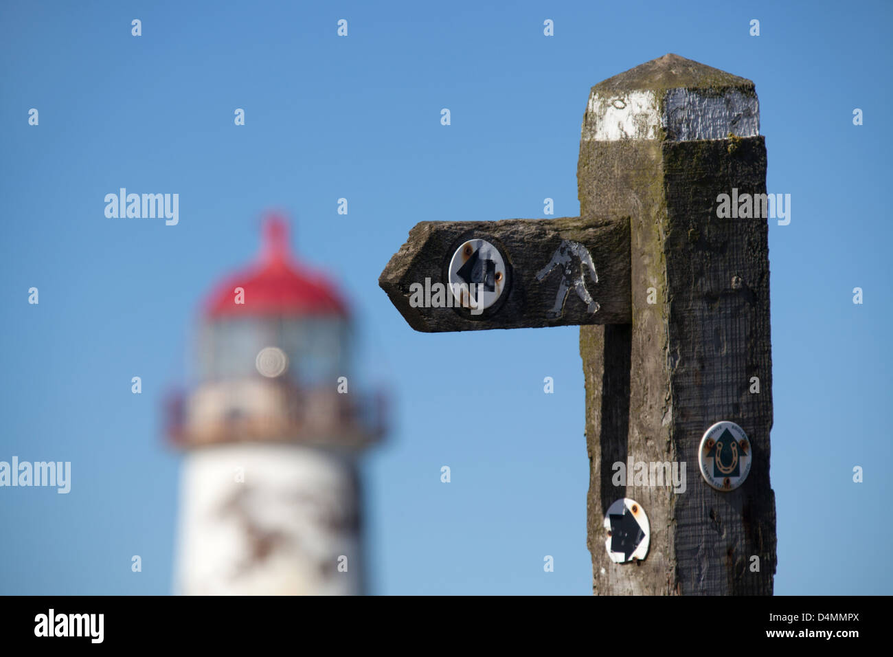 The Wales Coastal Path in North Wales. Path signpost on Talacre beach ...