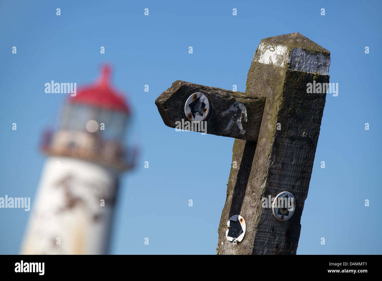 The Wales Coastal Path in North Wales. Path signpost on Talacre beach ...