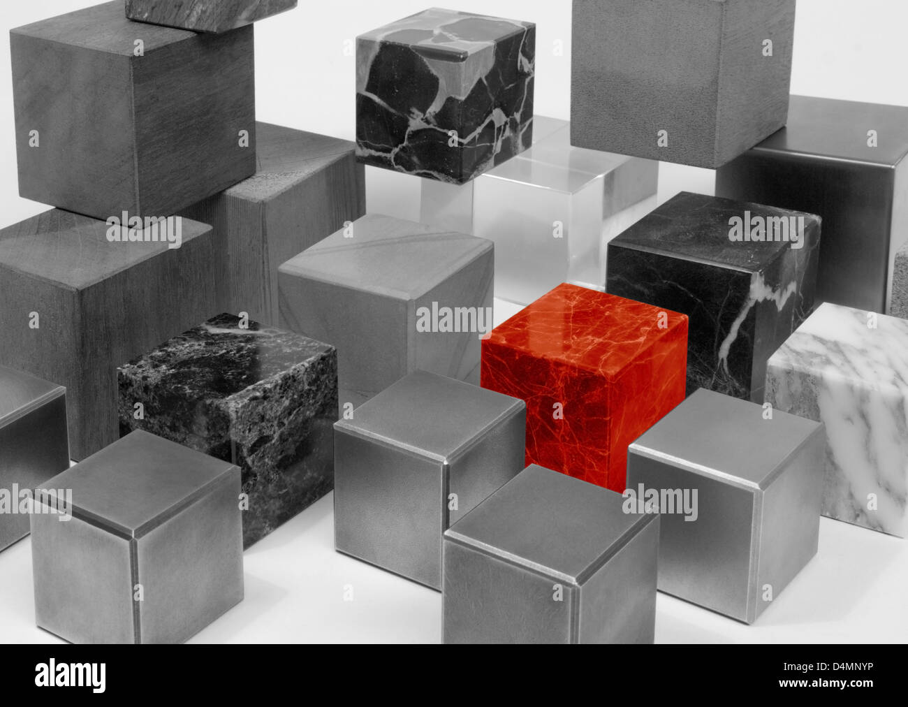 various cubes made of different materials, black and white toned ...