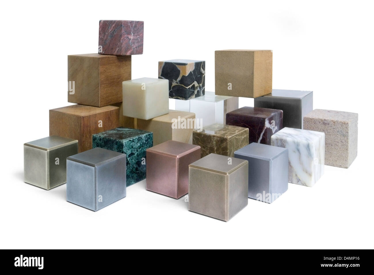 lots of various cubes made of different materials in white back Stock ...