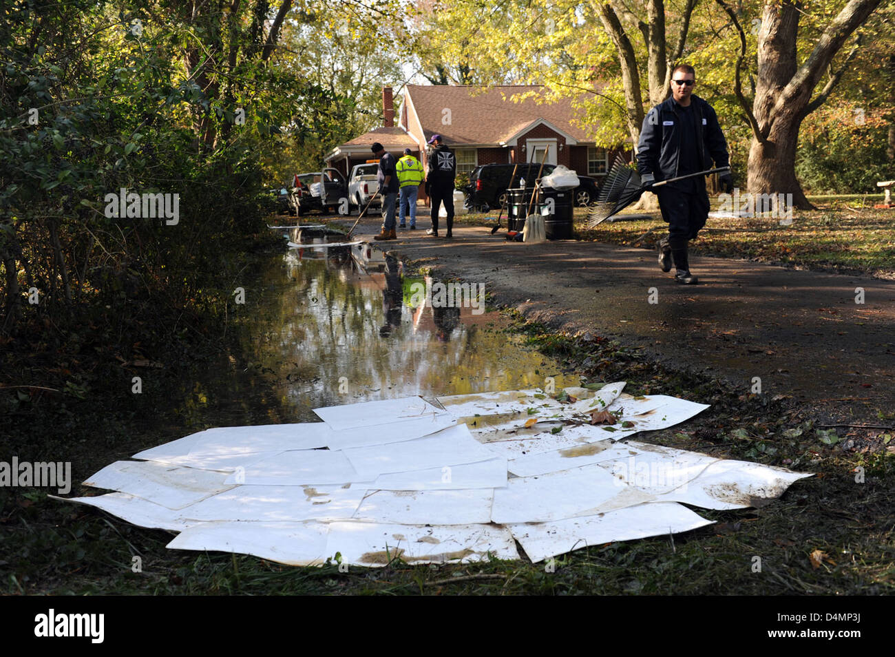 The Coast Guard conducts environmental cleanup operations to manage ...