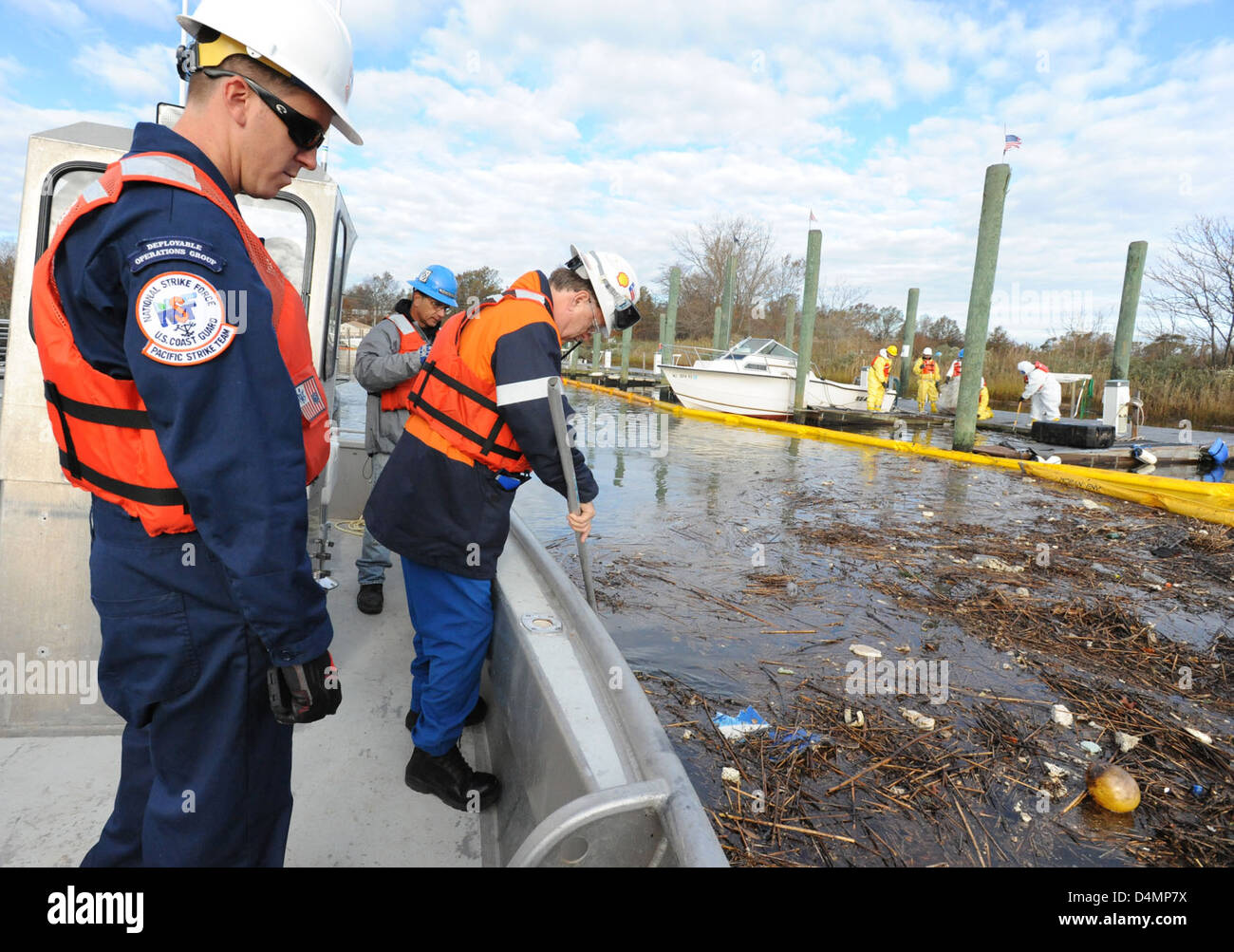 Following Hurricane Sandy, the Coast Guard coordinated the cleanup of ...