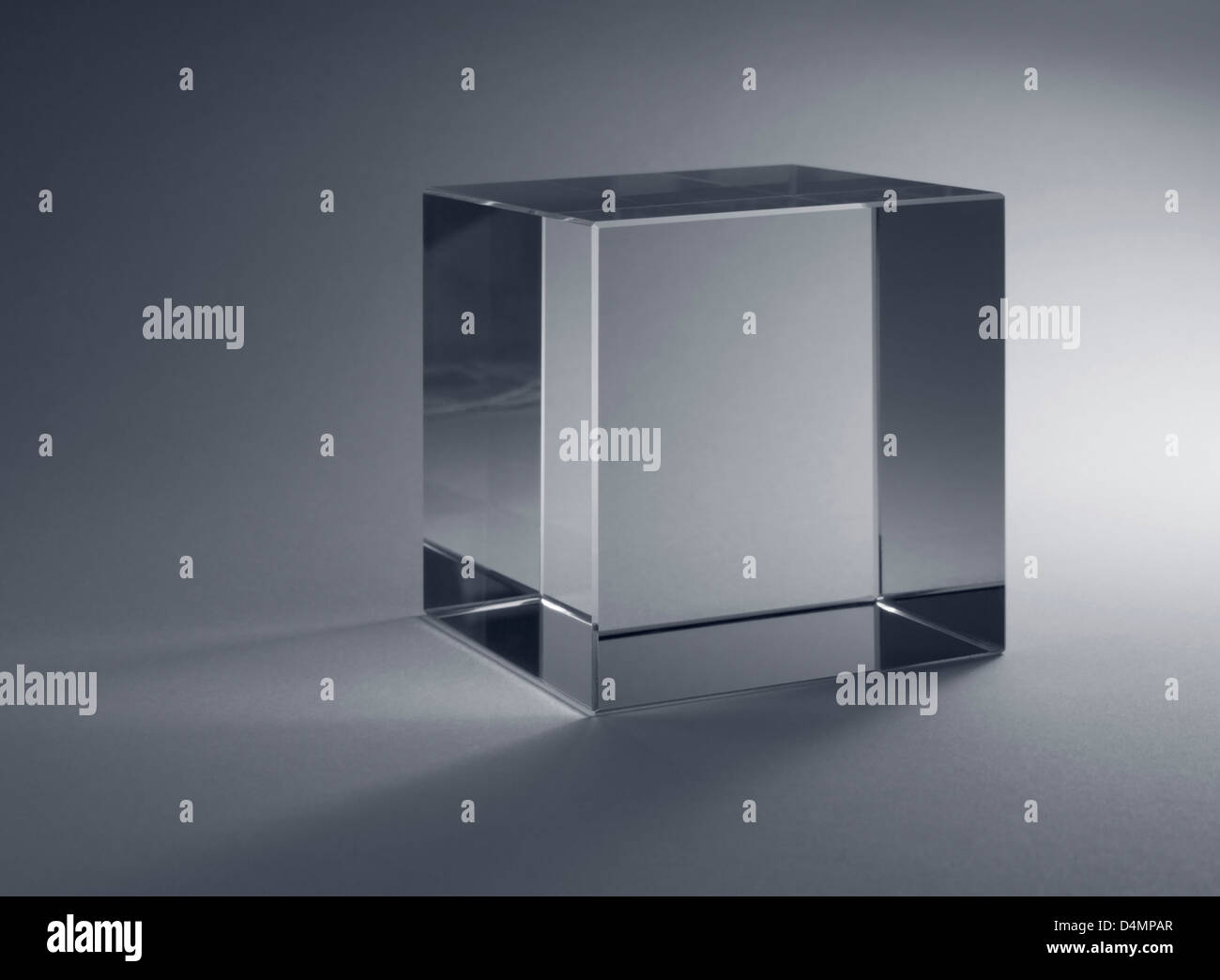 studio photography of a solid glass cube in grey back Stock Photo - Alamy