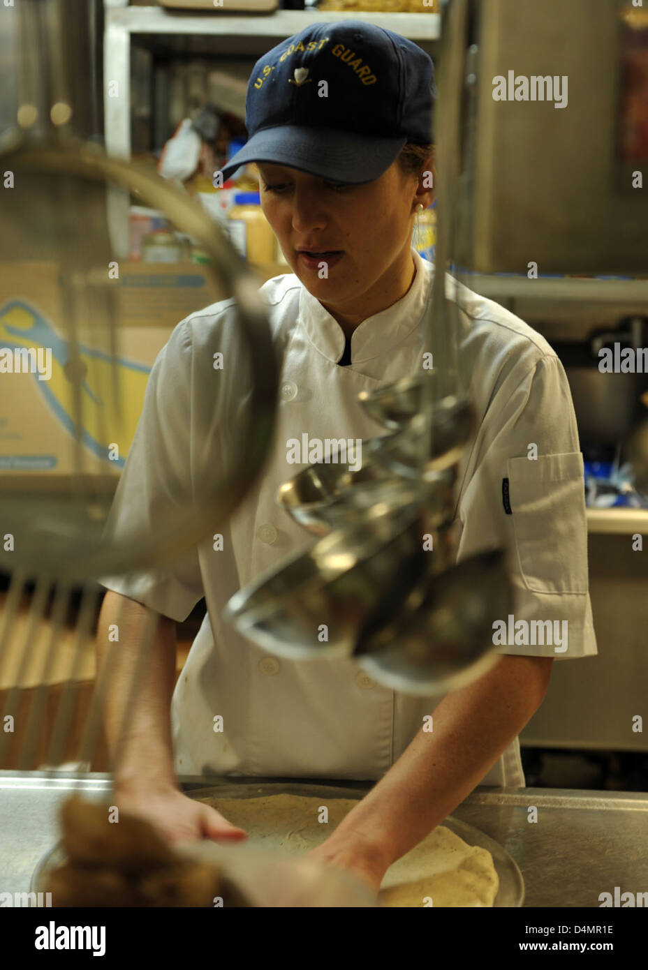 The crew of Coast Guard Cutter SPAR in Kodiak prepares for pizza night ...