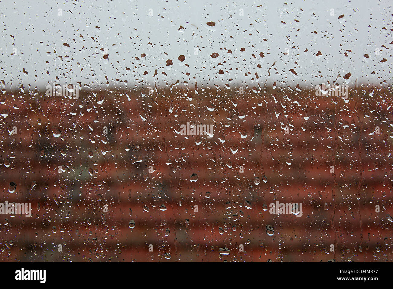 Rain on window glass building hi-res stock photography and images - Alamy