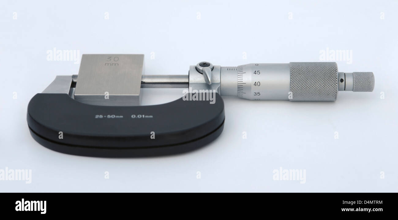 precision theme showing a micrometer isolated on white with clipping ...