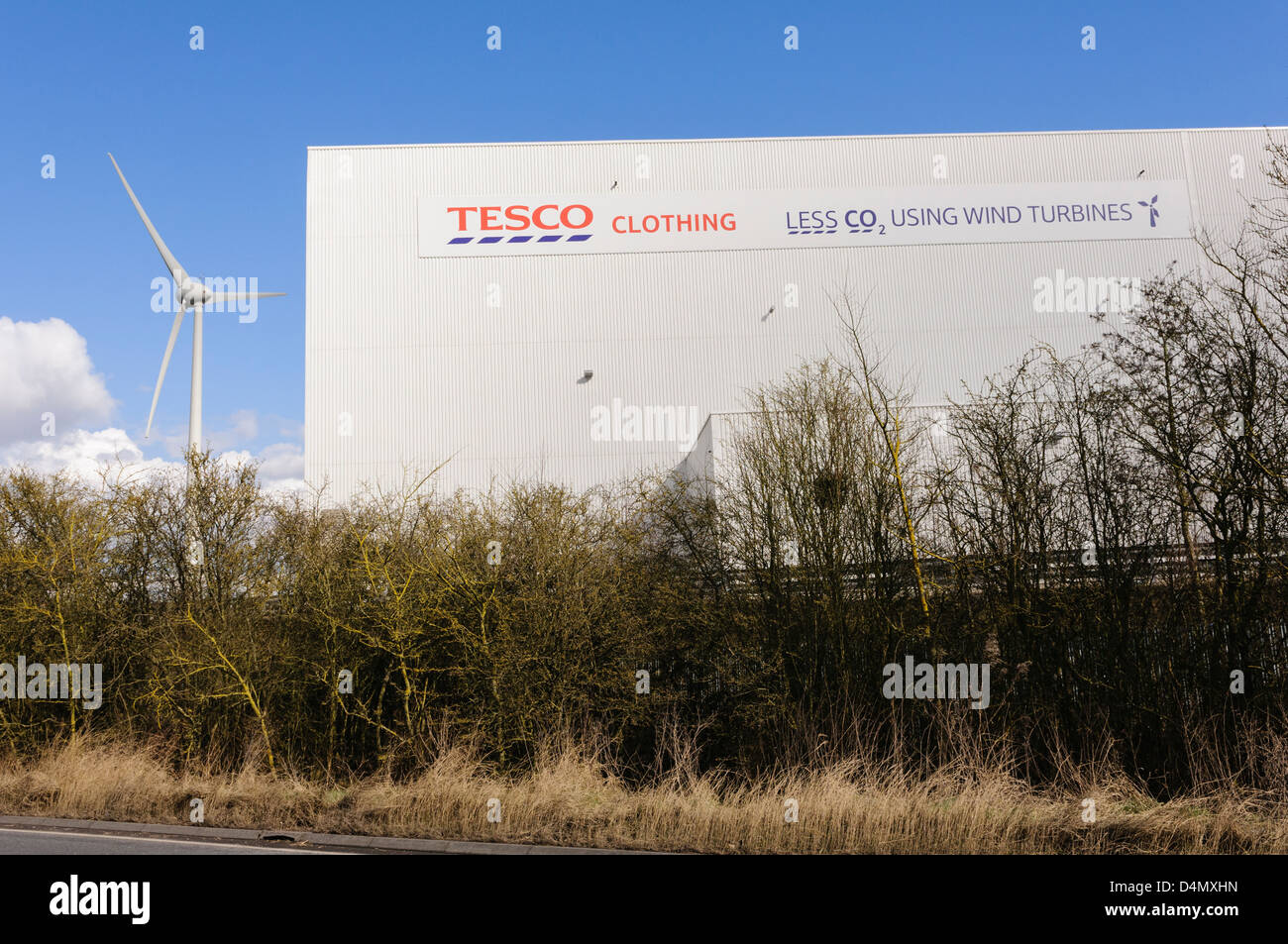 Large wind turbine powering a Tesco Warehouse at DIRFT, Daventry Stock ...