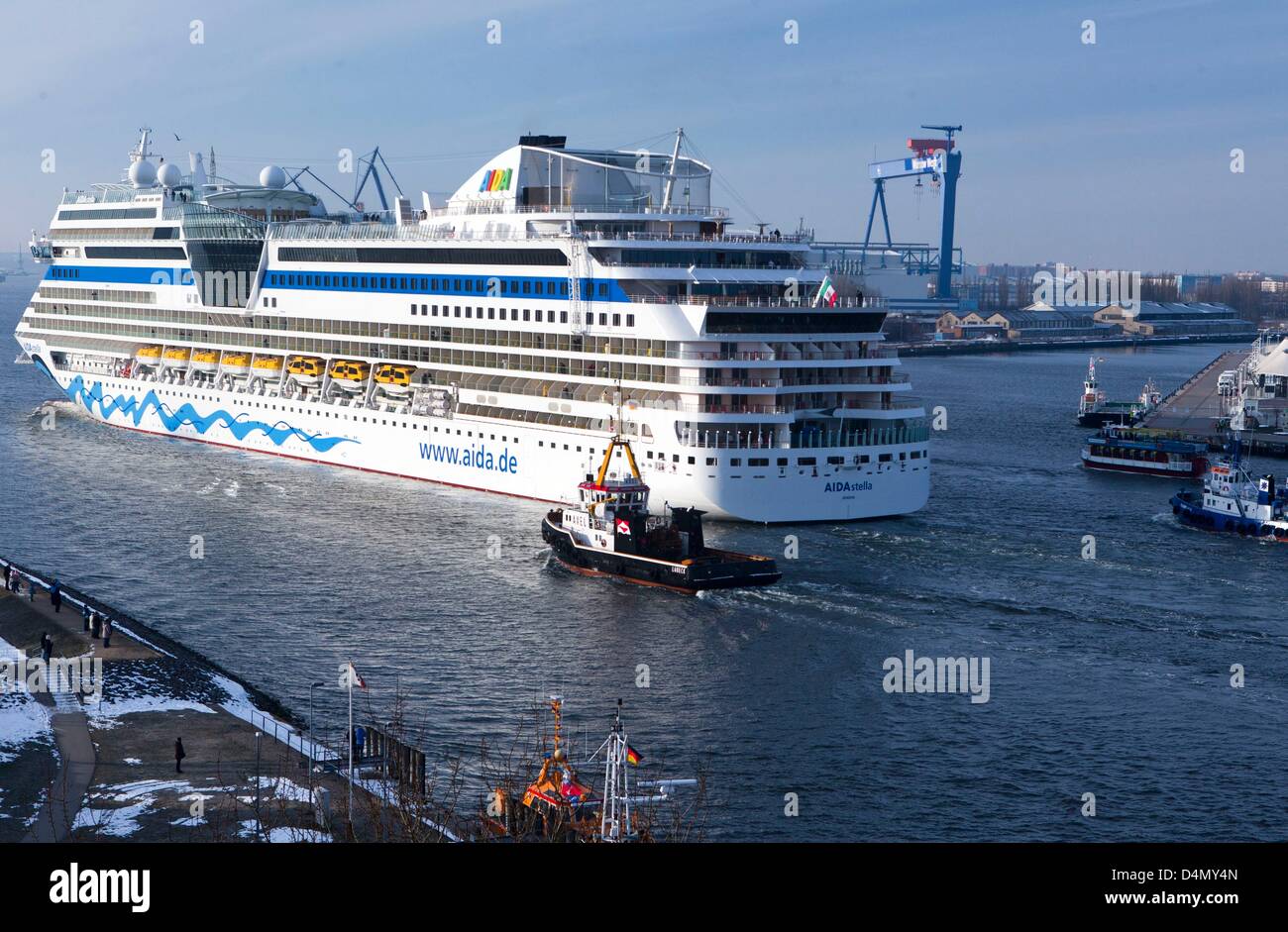 The newly built cruise ship 'AIDAstella' arrives to the port of Rostock ...