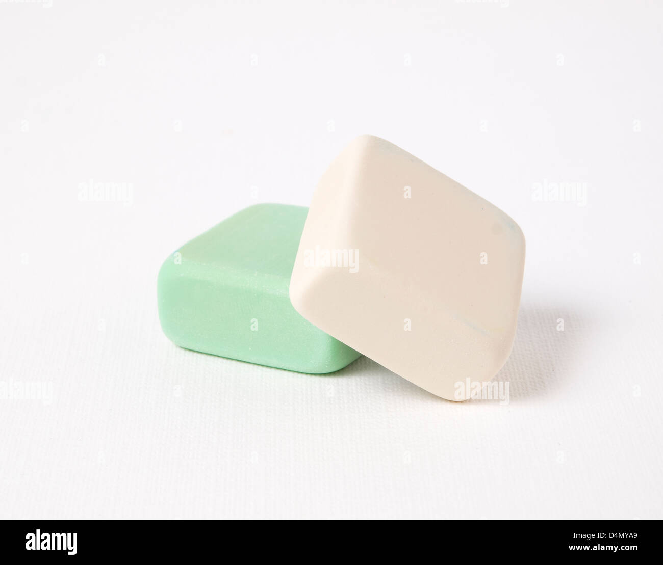 two erasers on white background Stock Photo - Alamy