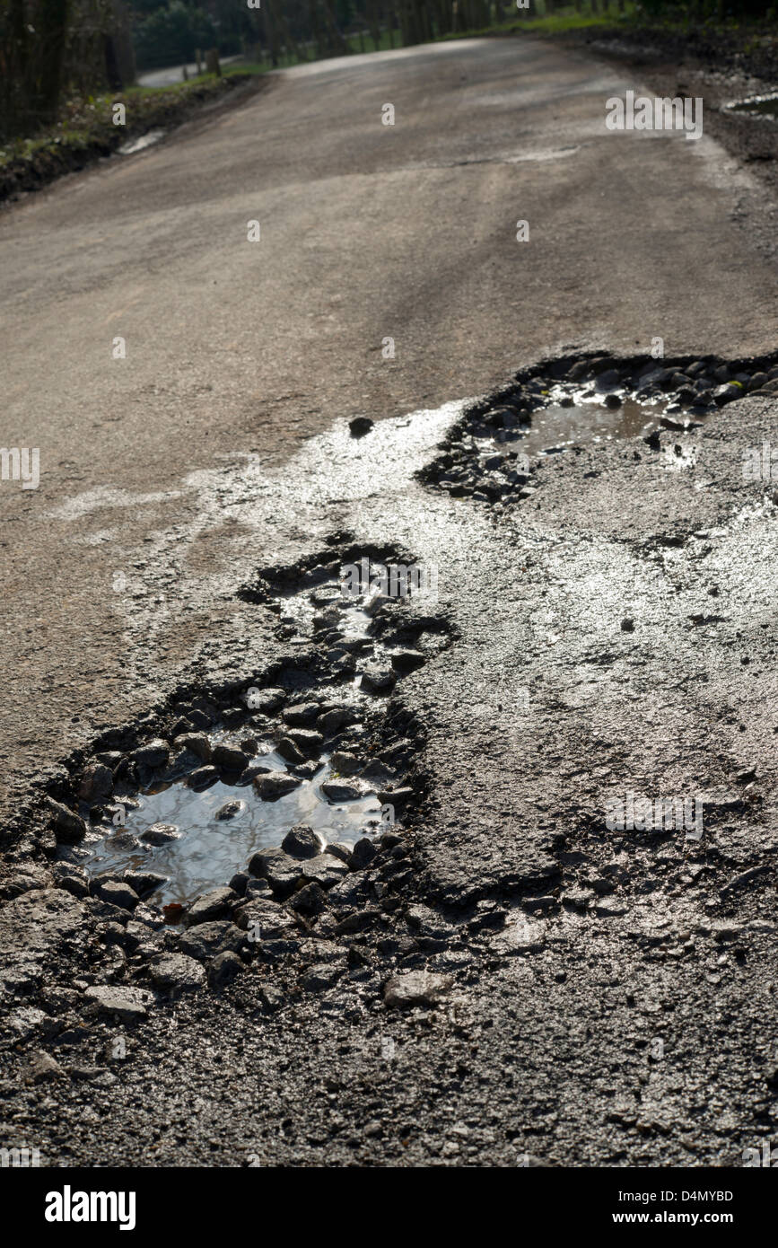 Potholes in country road hi-res stock photography and images - Alamy