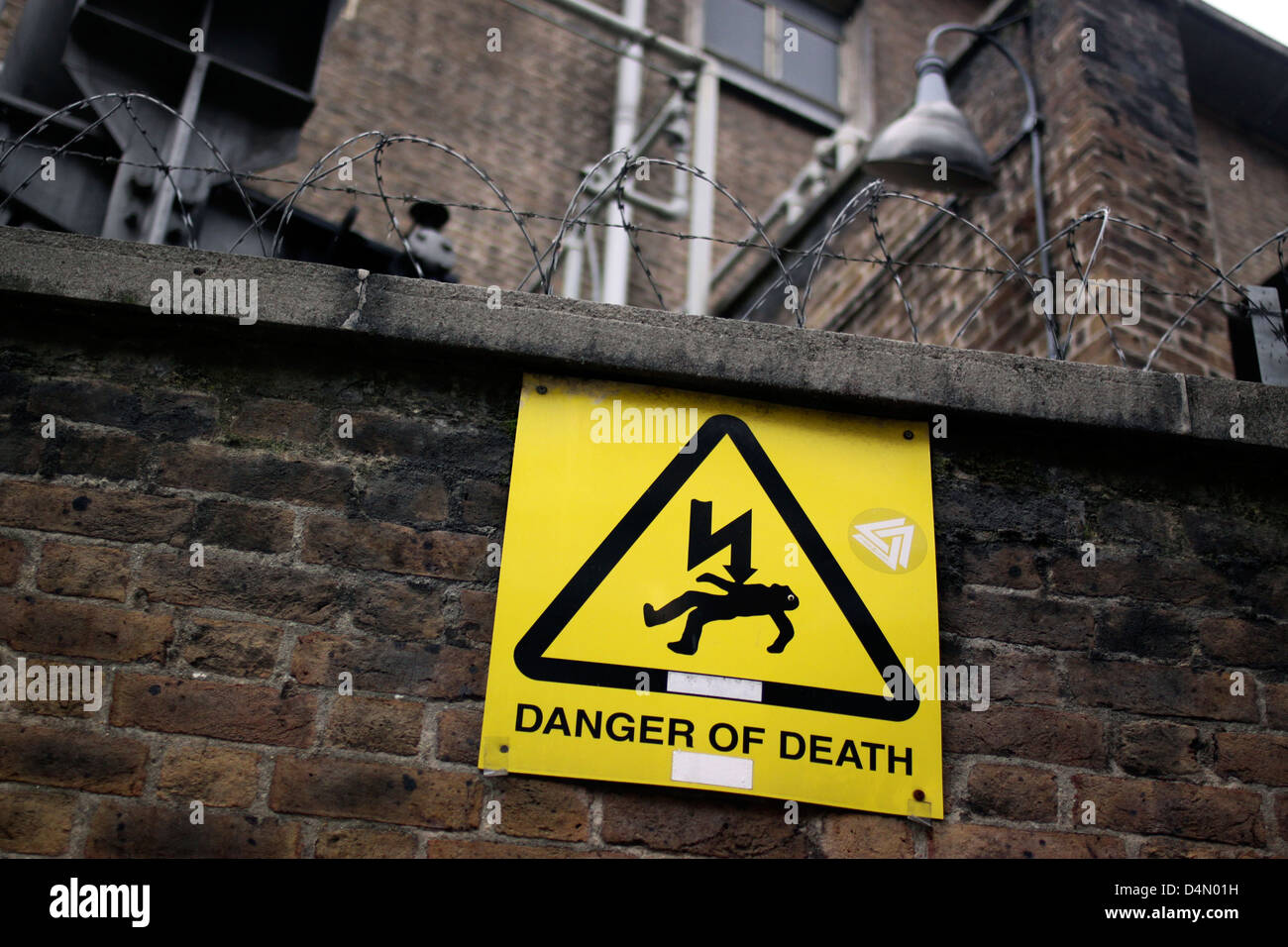 Danger of death sign near a electricity sub station in London Stock ...