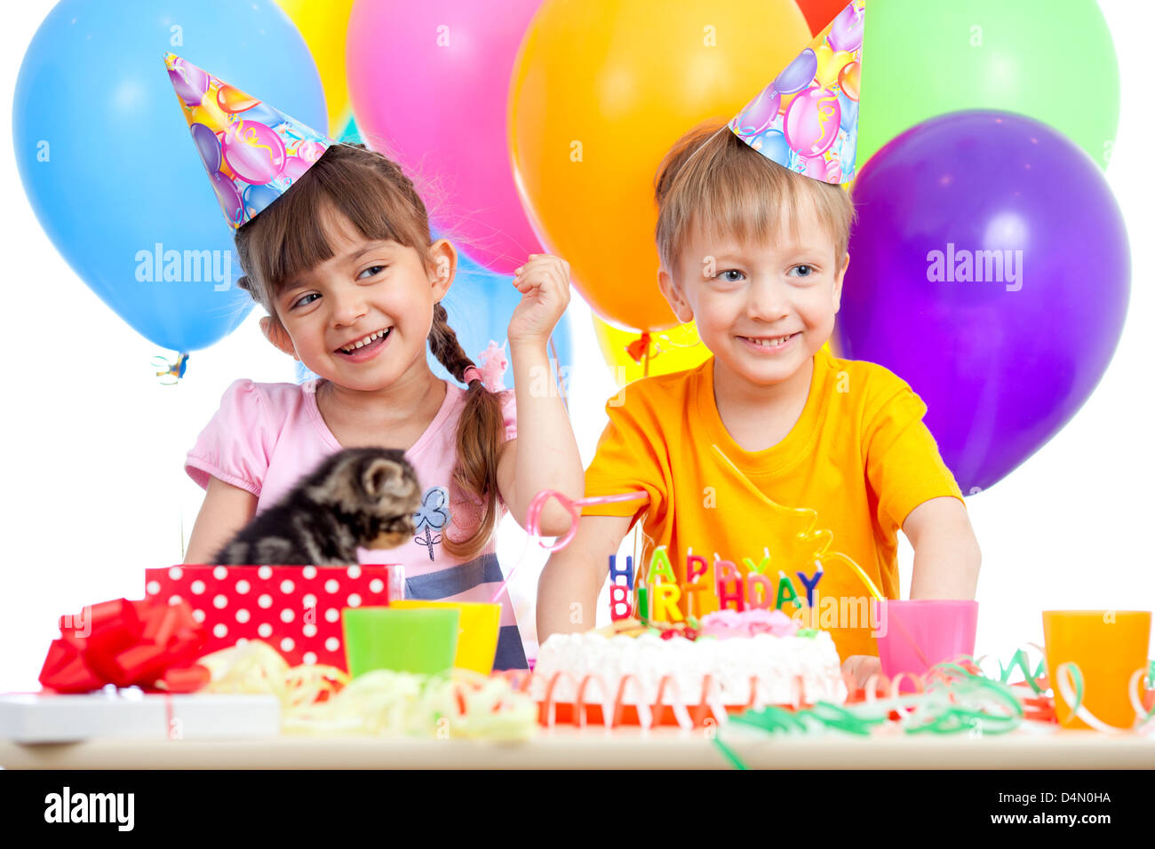 happy kids girl and boy celebrating birthday party Stock Photo - Alamy