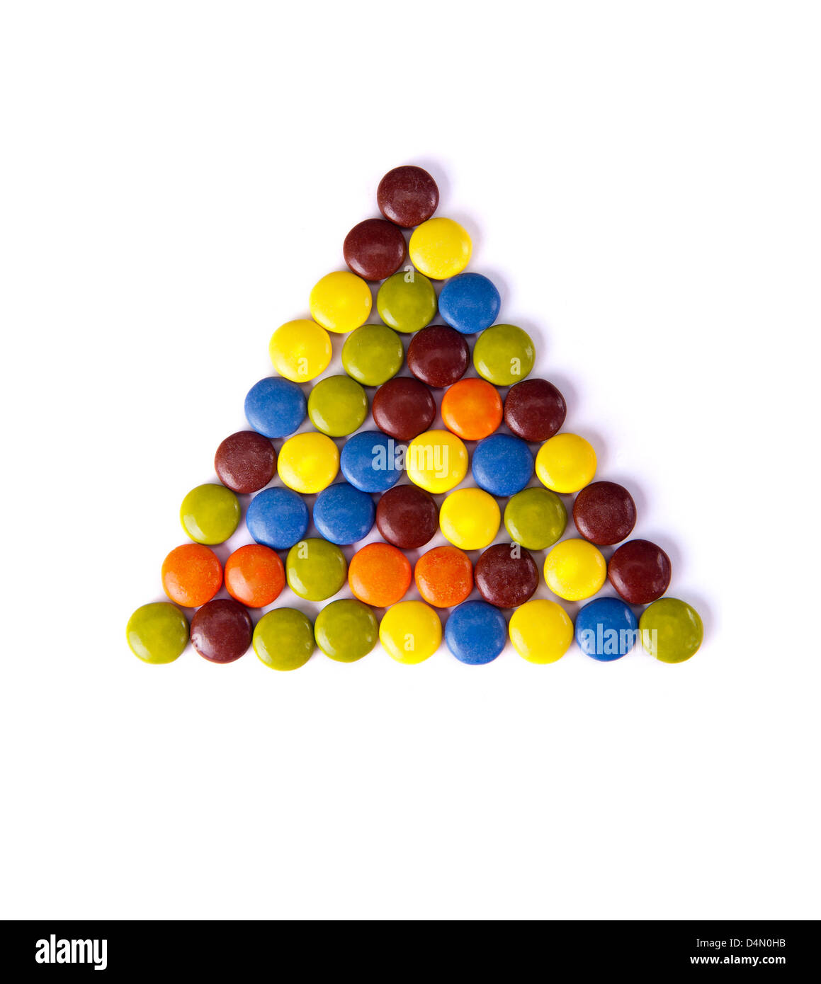 Triangle of colorful candies Stock Photo - Alamy