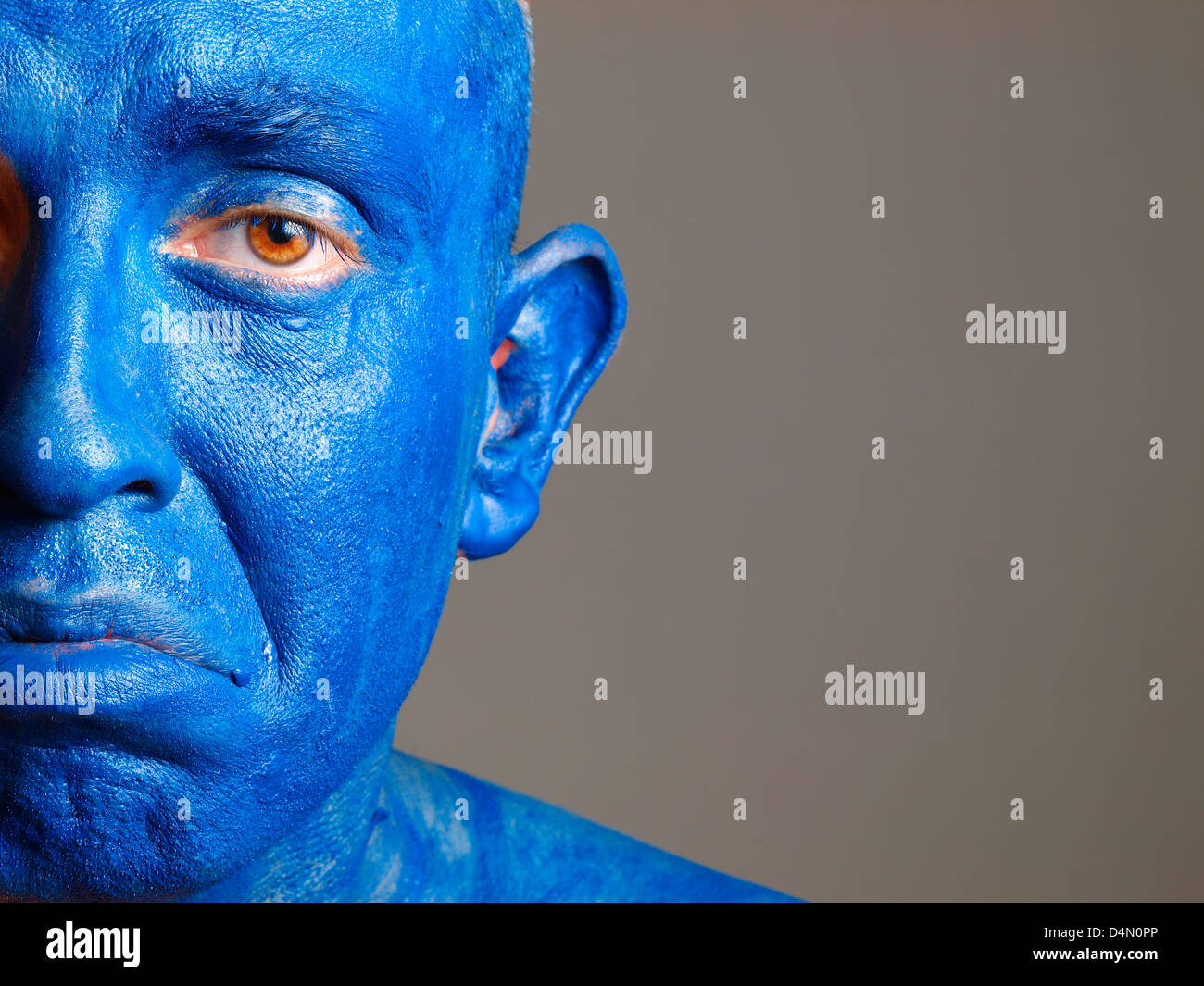 Sad man blue face Stock Photo - Alamy