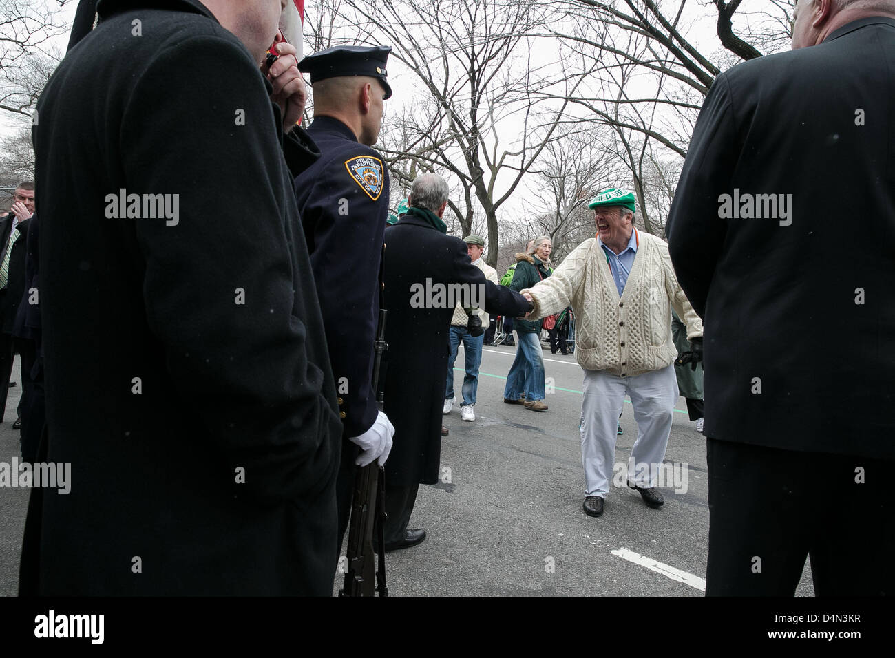 March, 16th, 2013, New York, NY, USA : A marcher shakes Mayor Bloomberg ...
