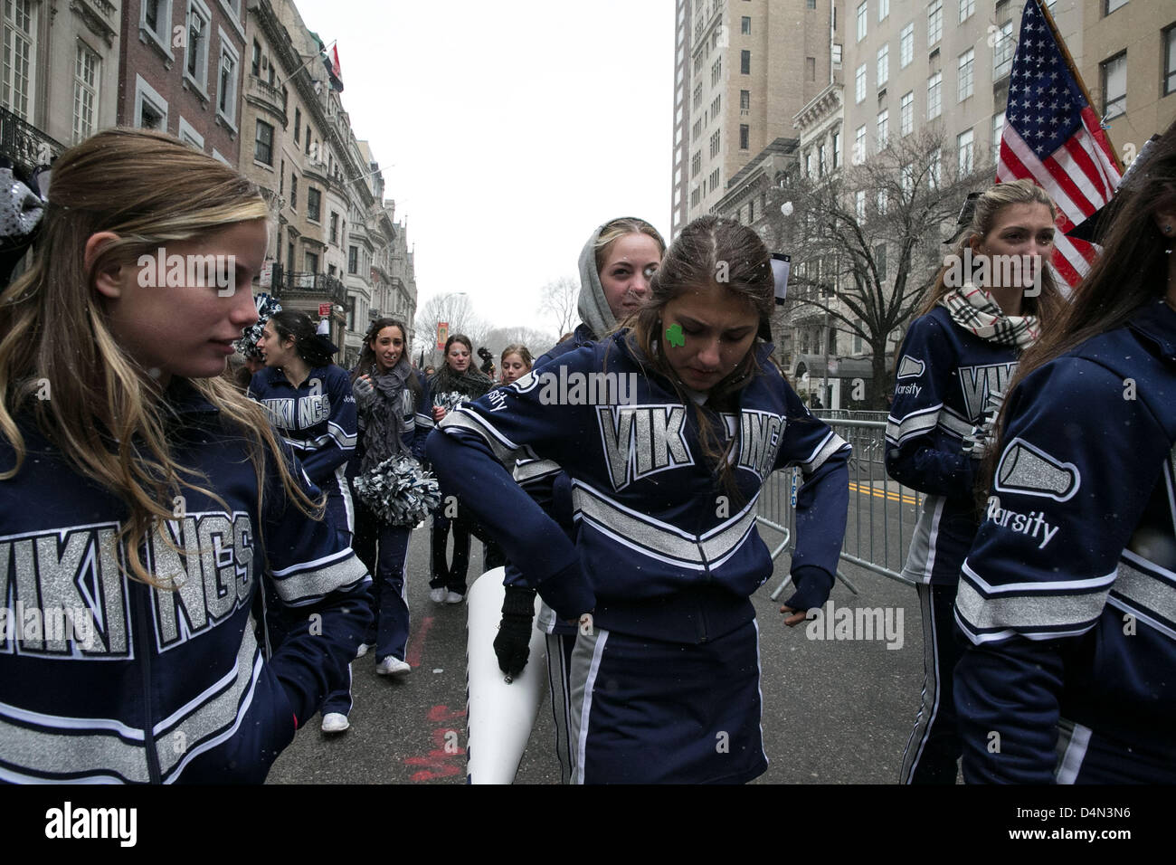 March, 16th, 2013, New York, NY, USA : A group of cheerleaders reach ...