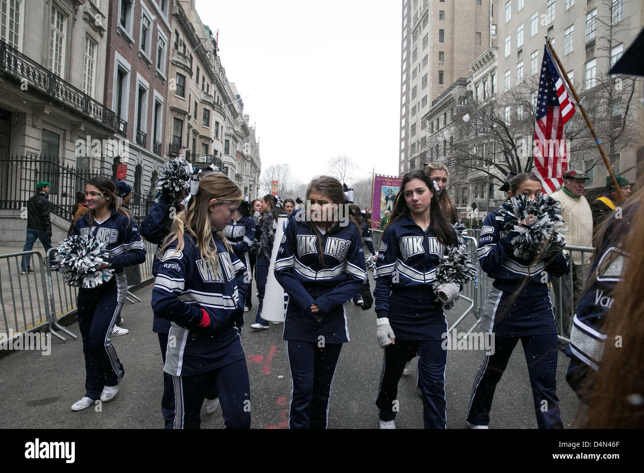 March, 16th, 2013, New York, NY, USA : A group of cheerleaders reach ...