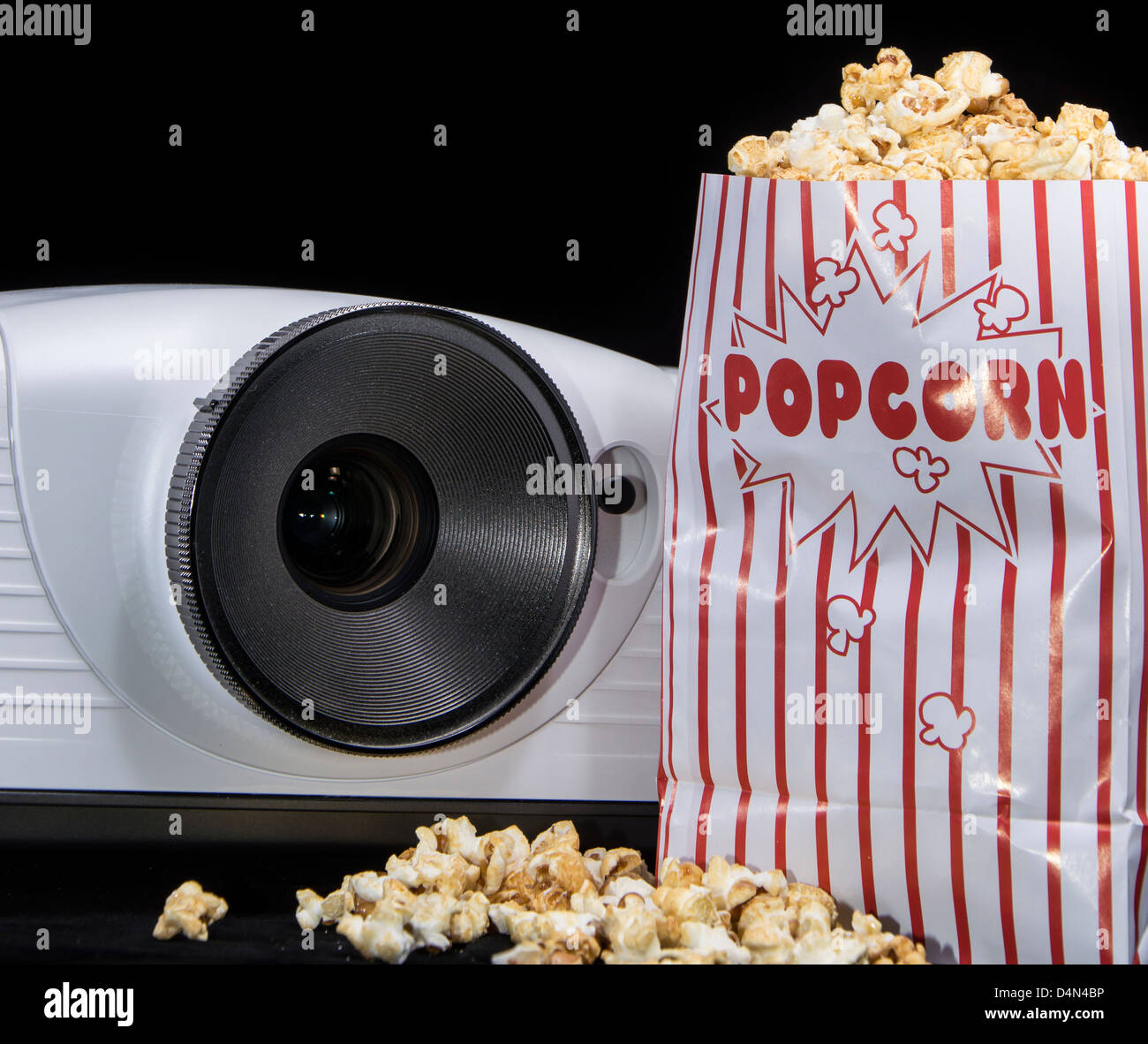 Home Cinema projector with fresh made Popcorn Stock Photo - Alamy