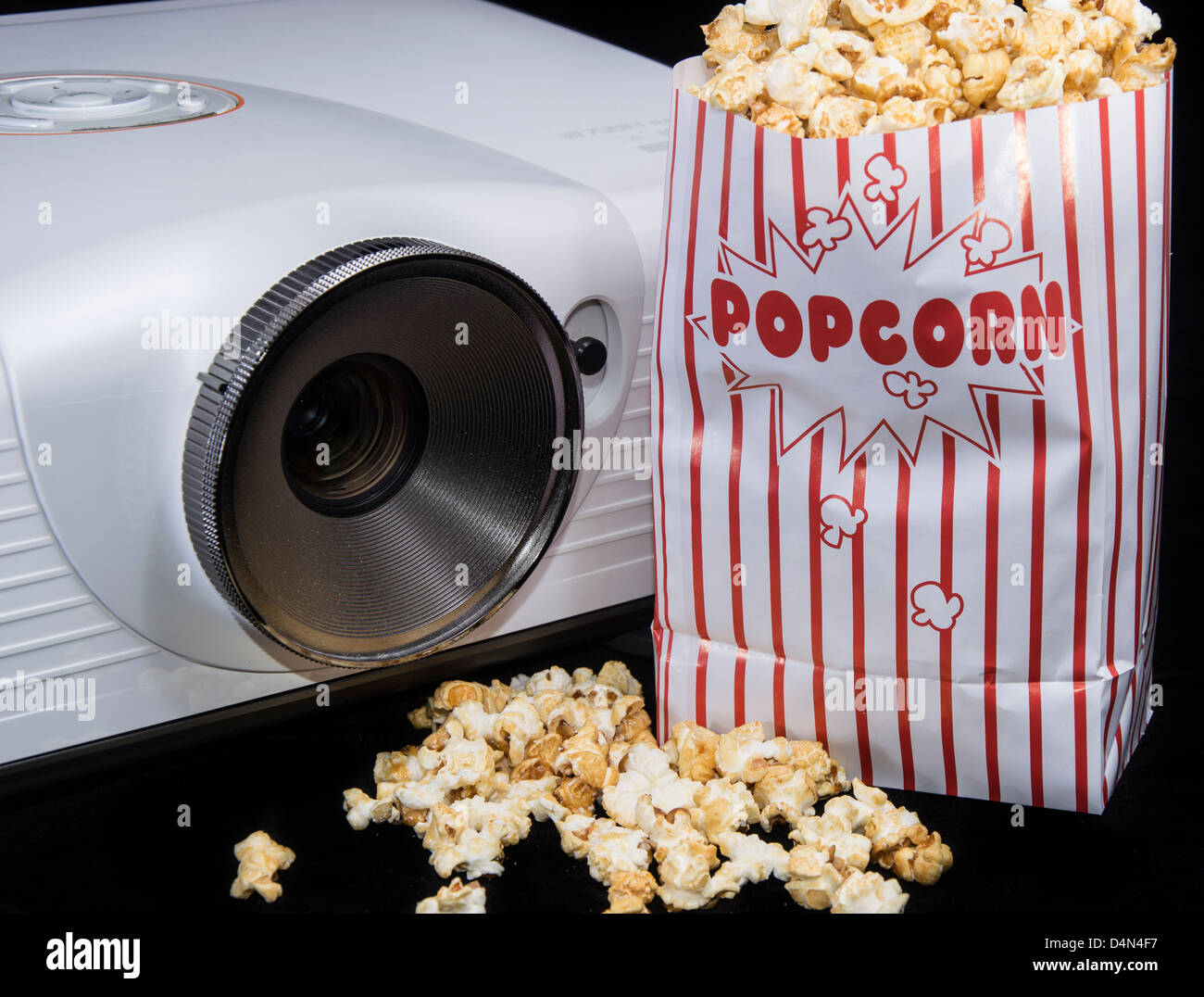 Home Cinema projector with fresh made Popcorn Stock Photo - Alamy