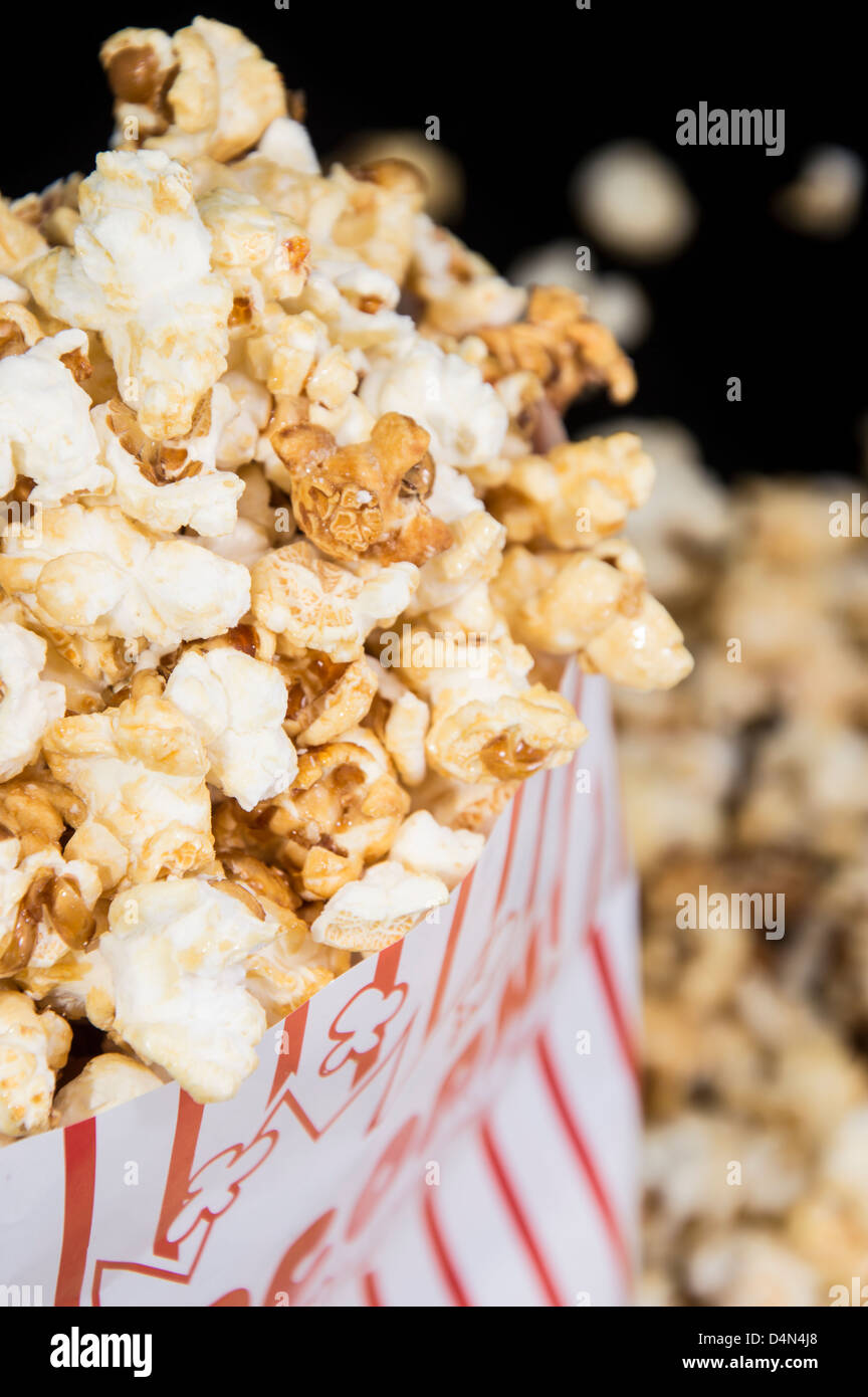 Popcorn isolated on black background Stock Photo - Alamy