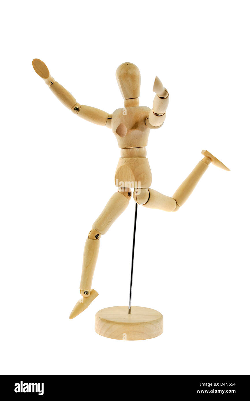 Wooden figure running isolated on white background Stock Photo - Alamy