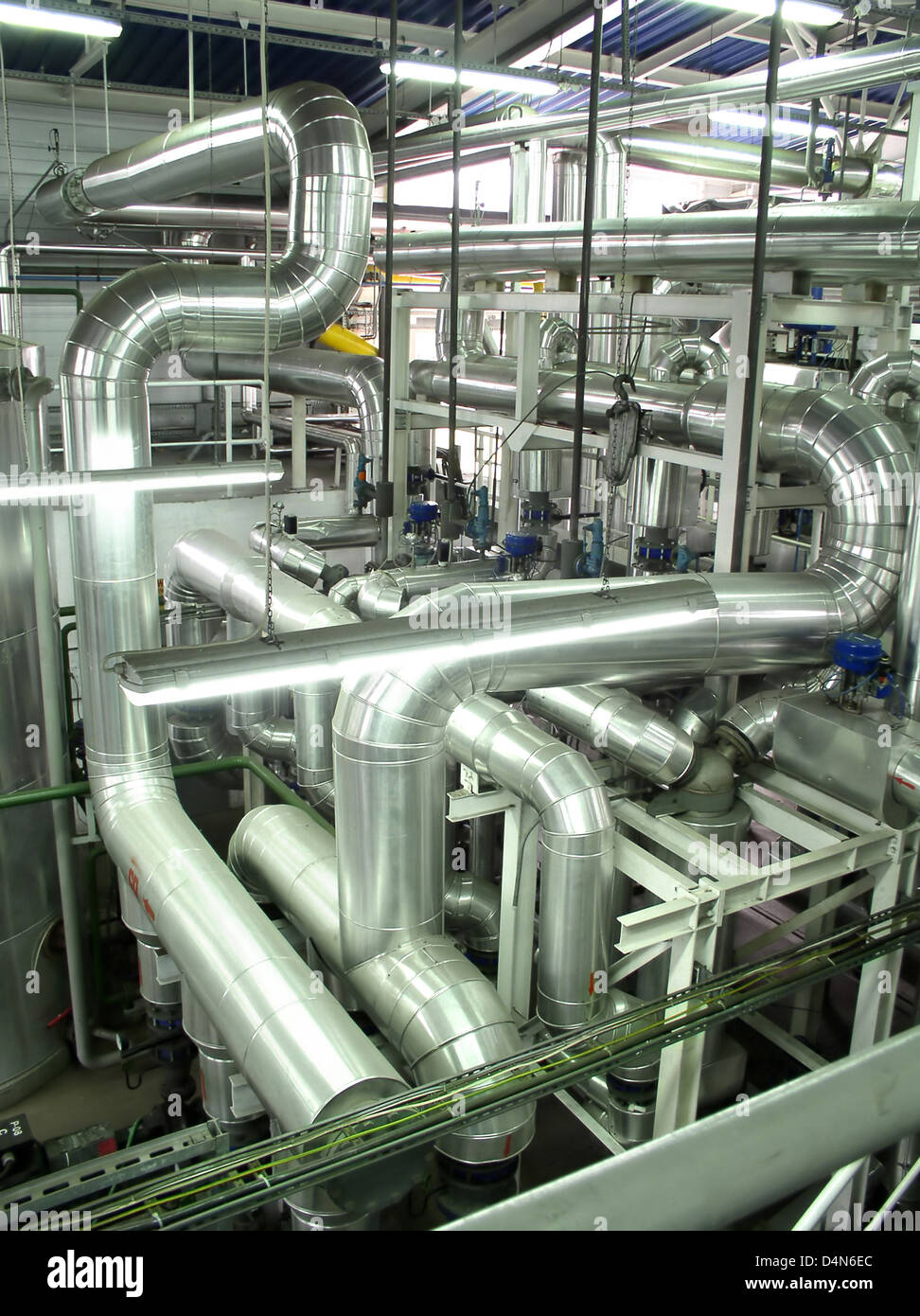 Connected pipes in factory Stock Photo - Alamy