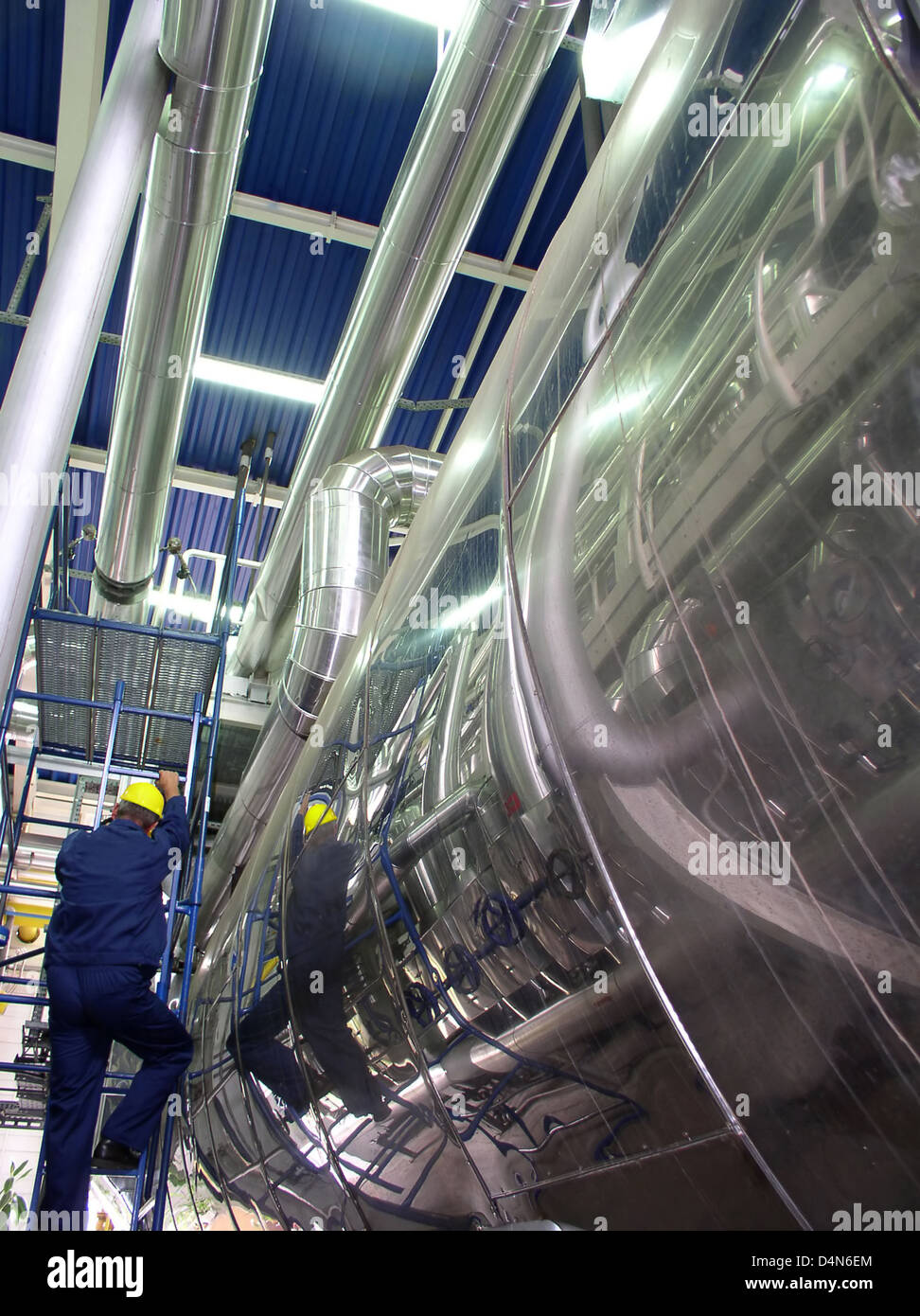 Engineer working on pipeline Stock Photo - Alamy