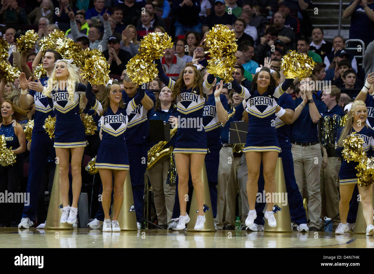 March 16, 2013: Akron cheerleader celebrate during the MAC Tournament ...