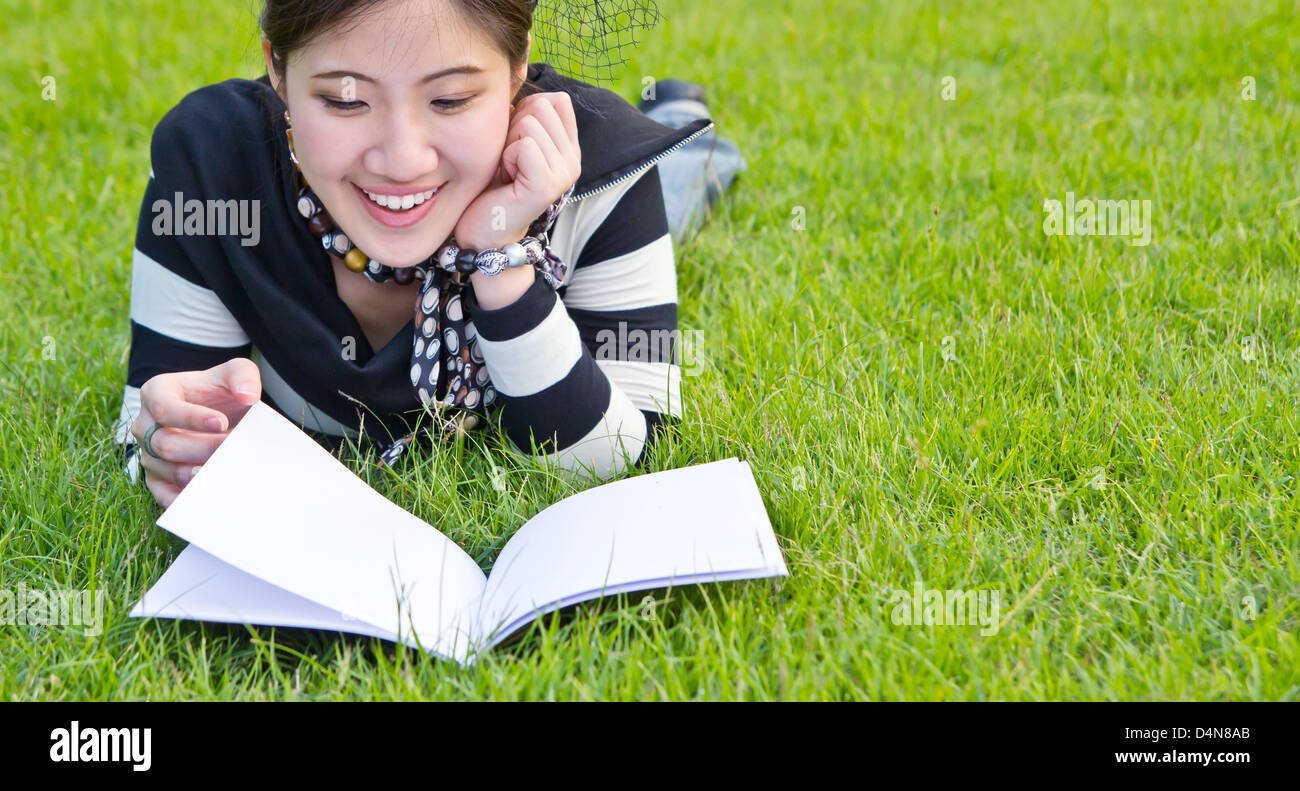 Asian girl reading book face hi-res stock photography and images - Alamy