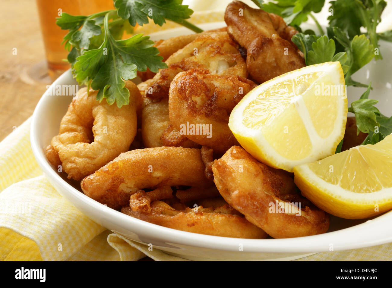 Fried calamari rings dipped batter hi-res stock photography and images ...