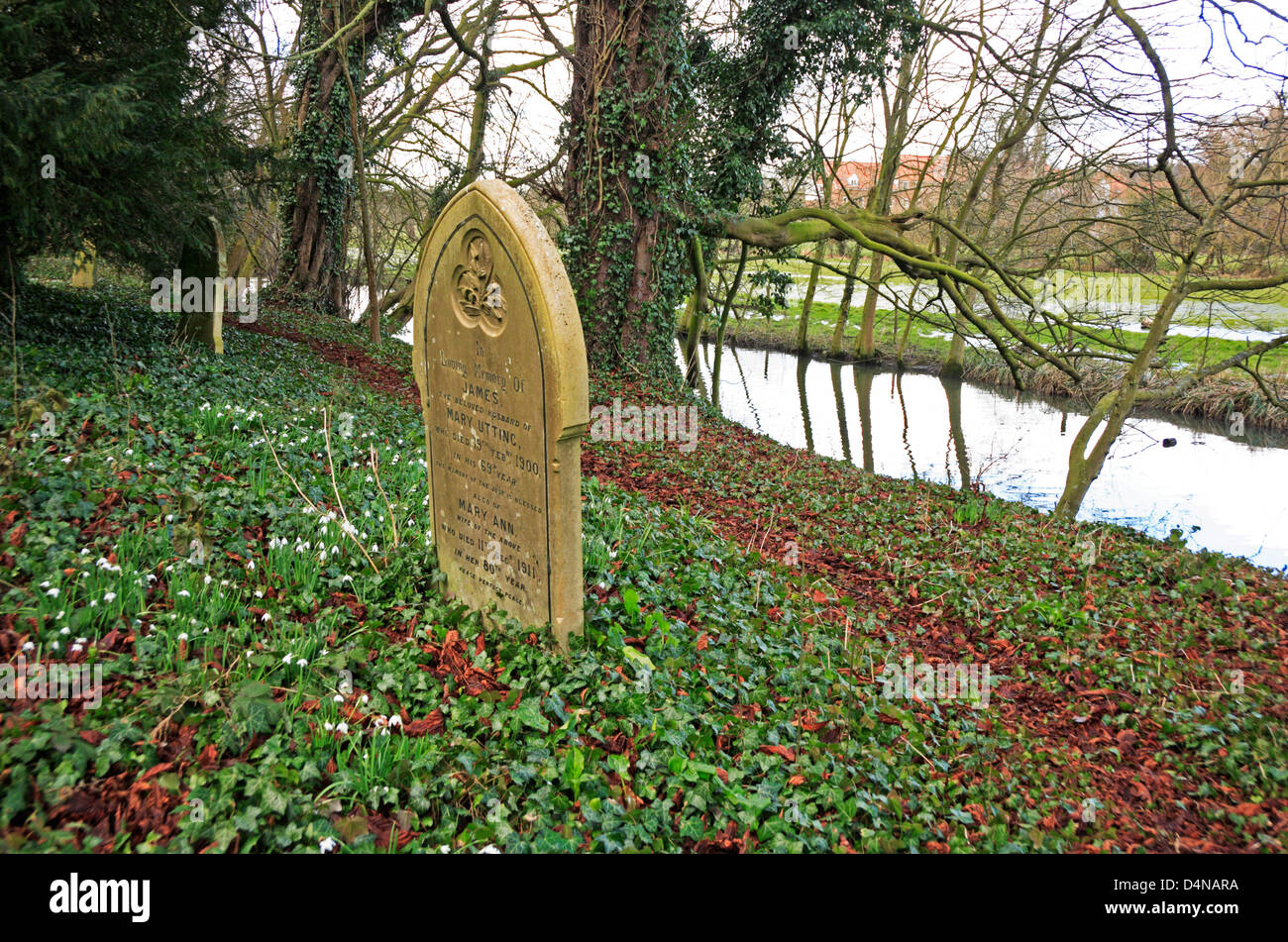 A view of headstones and footpath by the River Tas at Trowse Newton ...