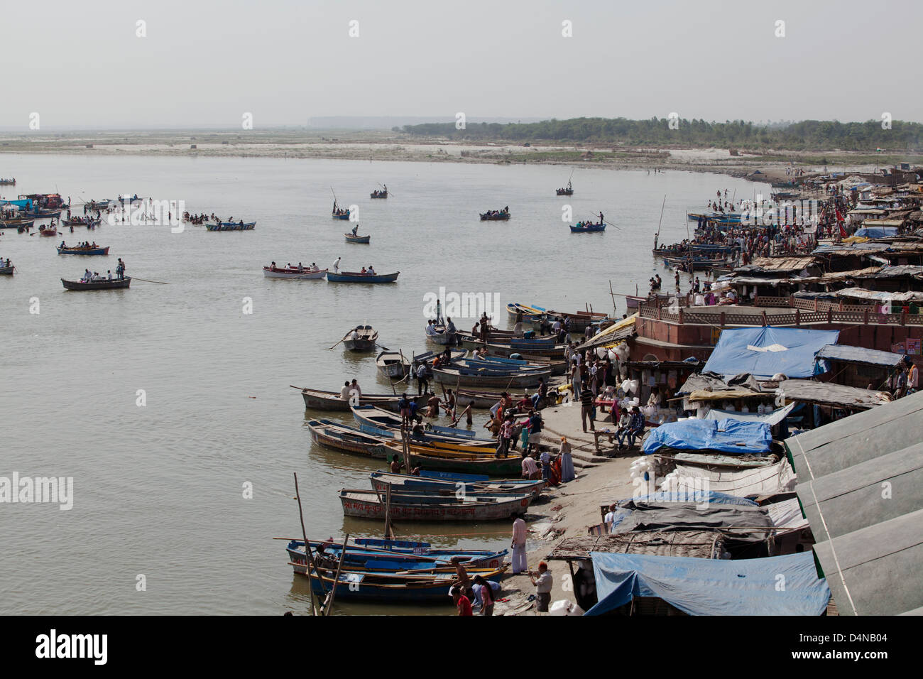 row boats on the Ganges River at the holy city of Garhmukteshwar, Uttar ...