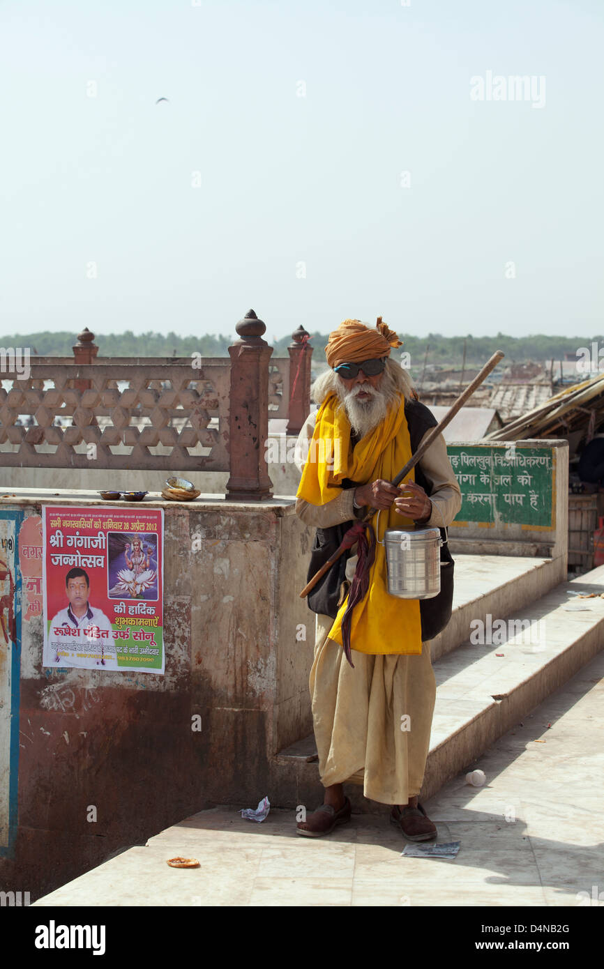 A Sadhu (yogi) holy man at the Embankment of the Ganges River at the ...