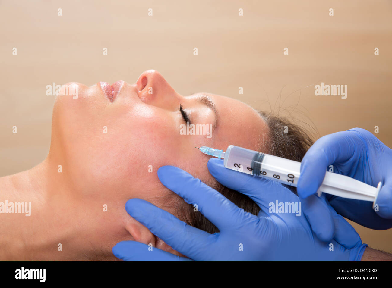 Anti aging facial mesotherapy with syringe closeup on woman face Stock ...