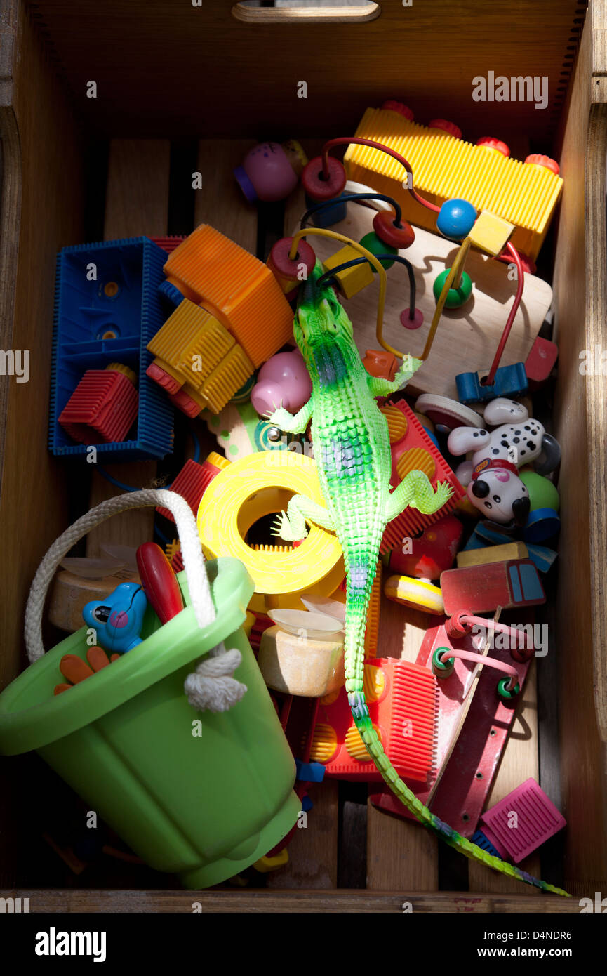 Children's Play things in a Box Stock Photo - Alamy