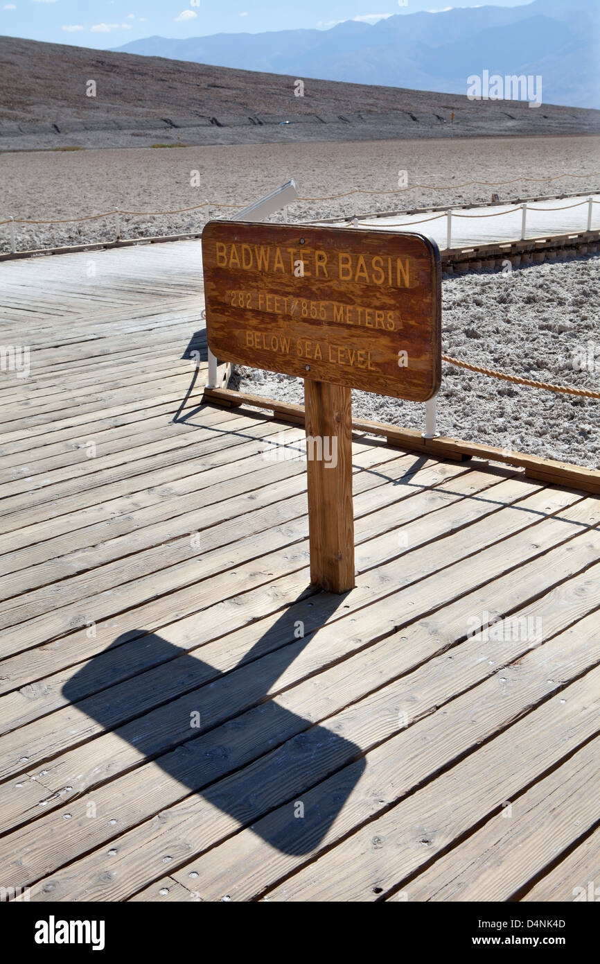 Bad Water' sign beside a lake with mountains in the distance Stock ...