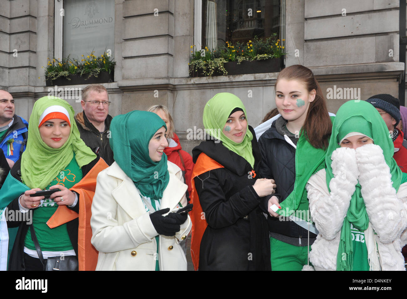 Piccadilly, London, UK. 17th March 2013. A group of girls wearing green ...