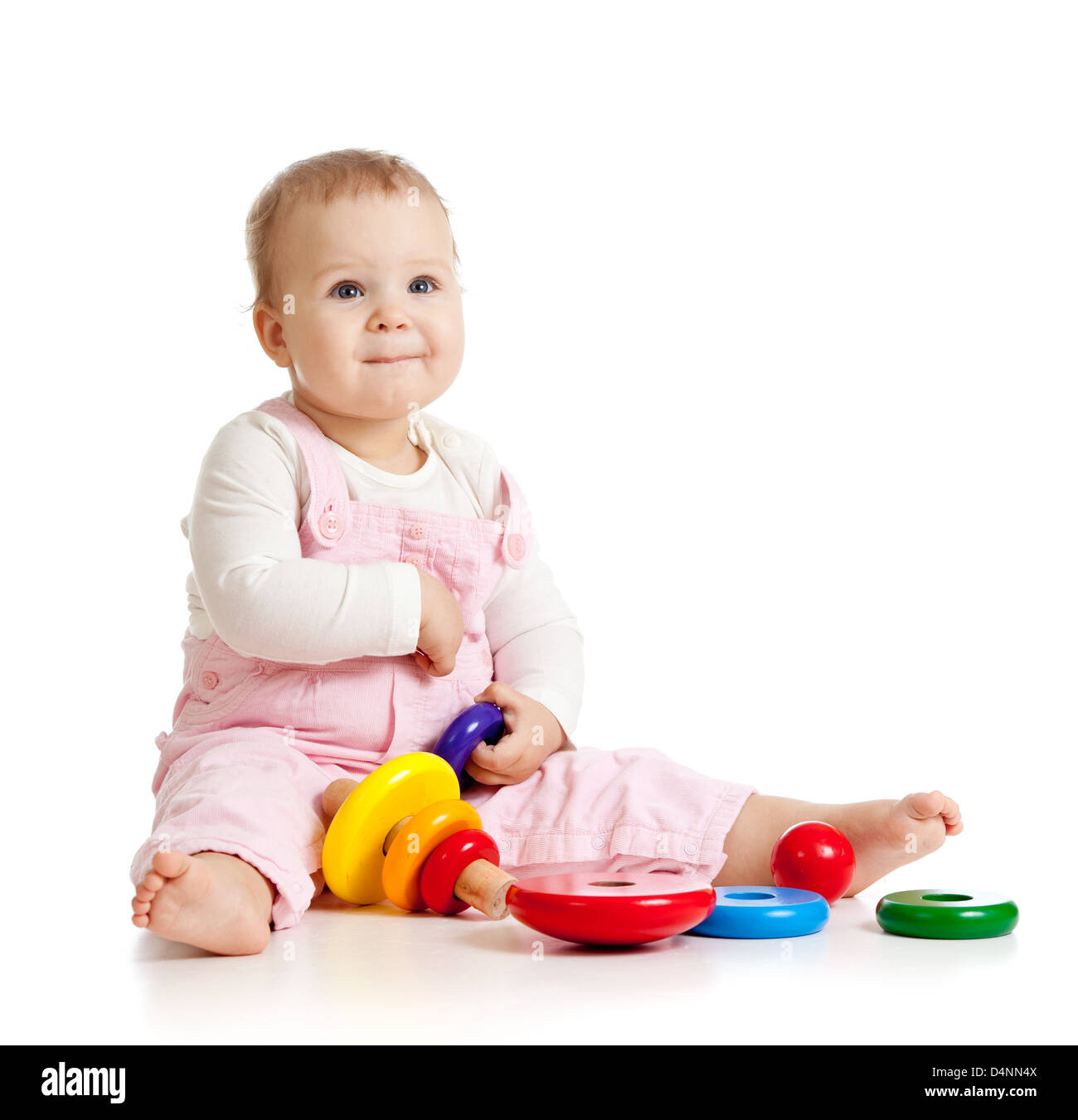 pretty baby or kid playing with color toy Stock Photo - Alamy