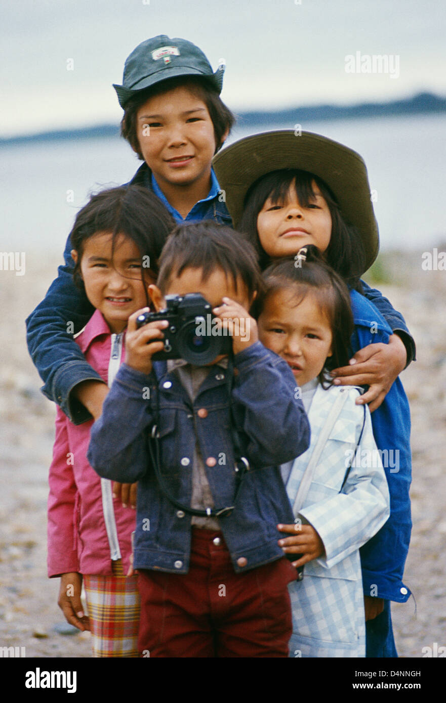First Nation aboriginal Children posing with camera at Wenisik in ...