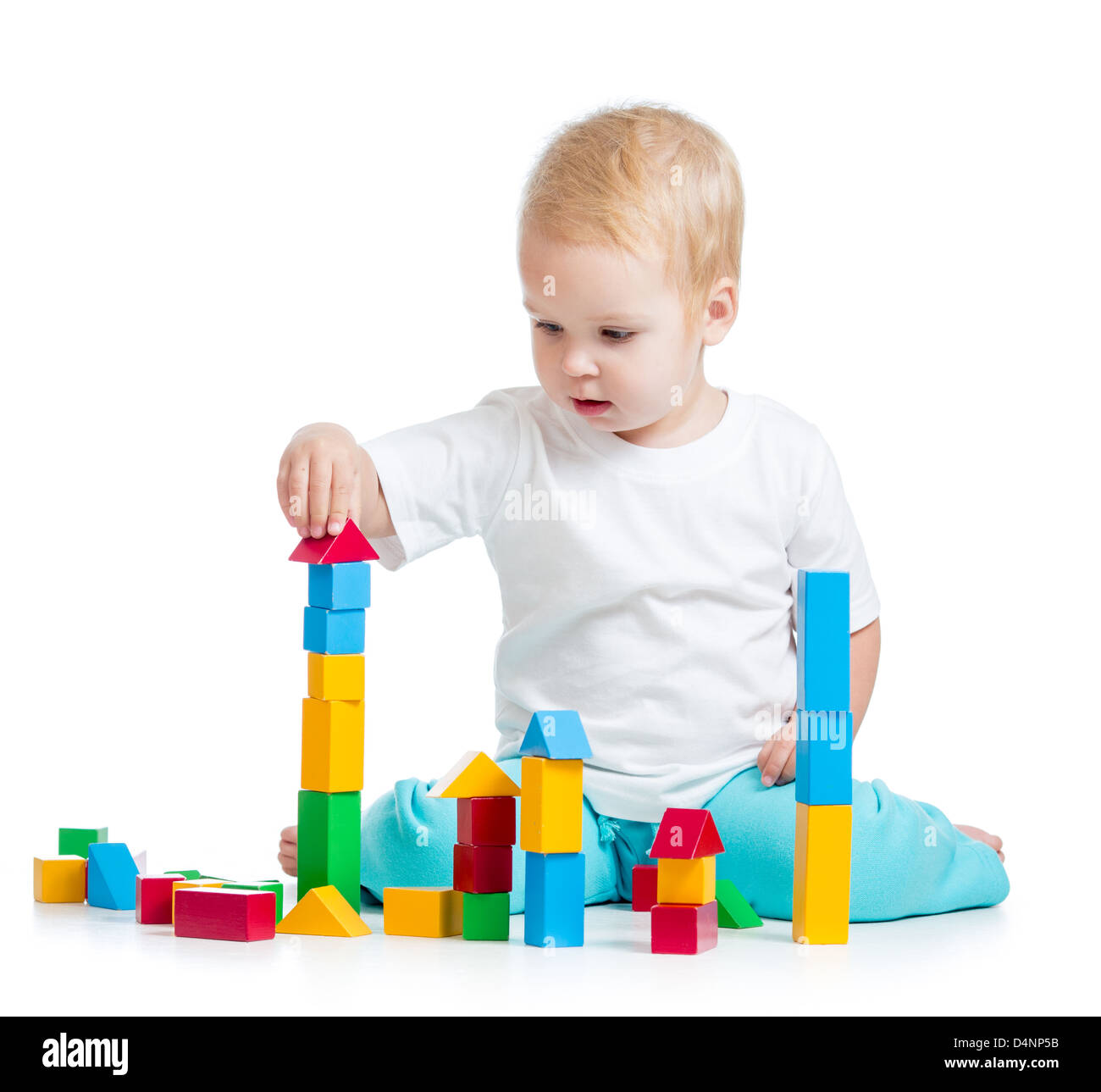 kid girl playing toy blocks isolated on white background Stock Photo ...