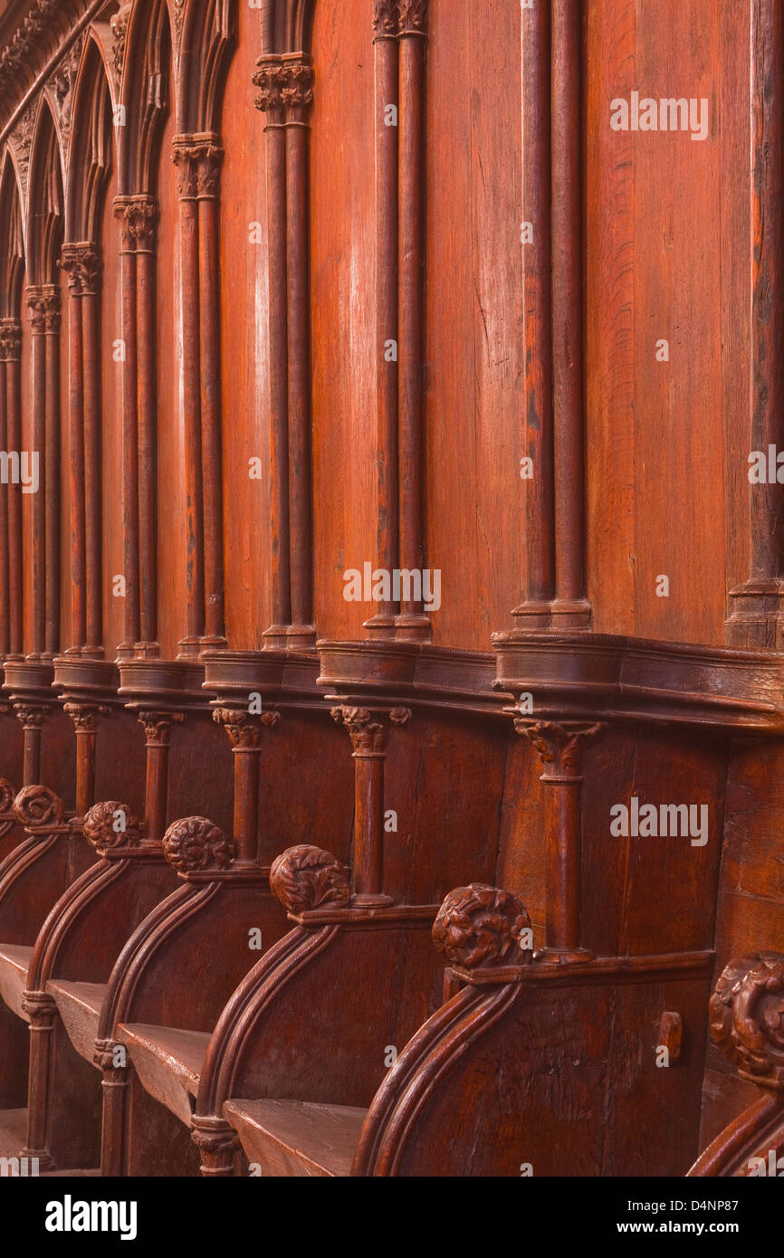 Sculpted wooden choir stall in Poitiers cathedral Stock Photo - Alamy