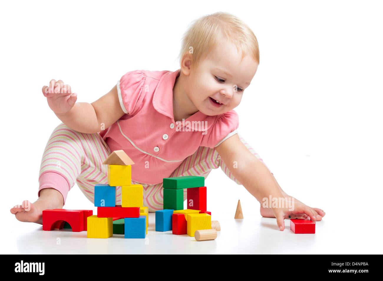 Happy kid playing toy blocks isolated on white background Stock Photo ...