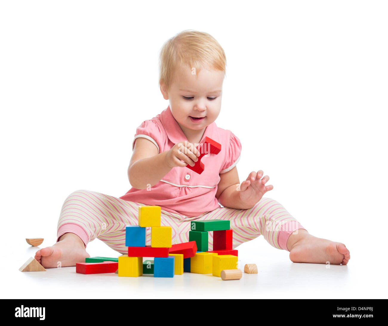 Happy kid playing toy blocks isolated on white background Stock Photo ...
