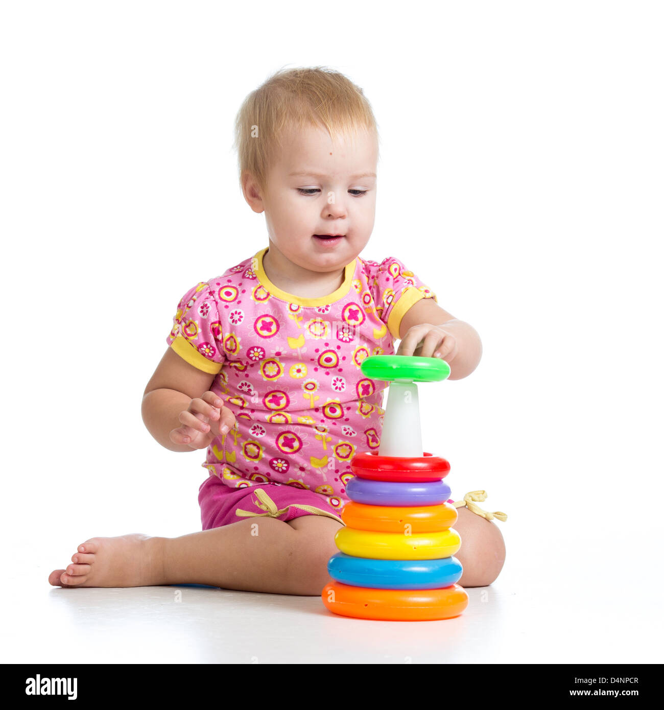 kid girl playing with pyramid toy isolated on white background Stock ...