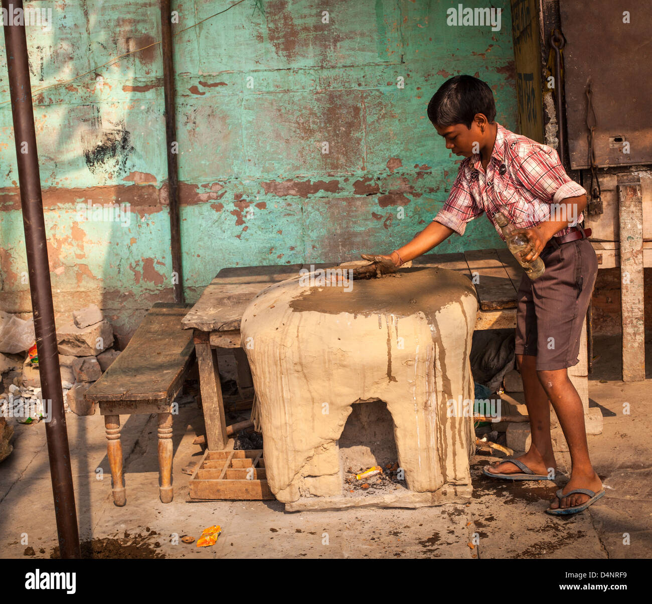 Indian boy, working on his own, Uttar Pradesh, India Stock Photo - Alamy